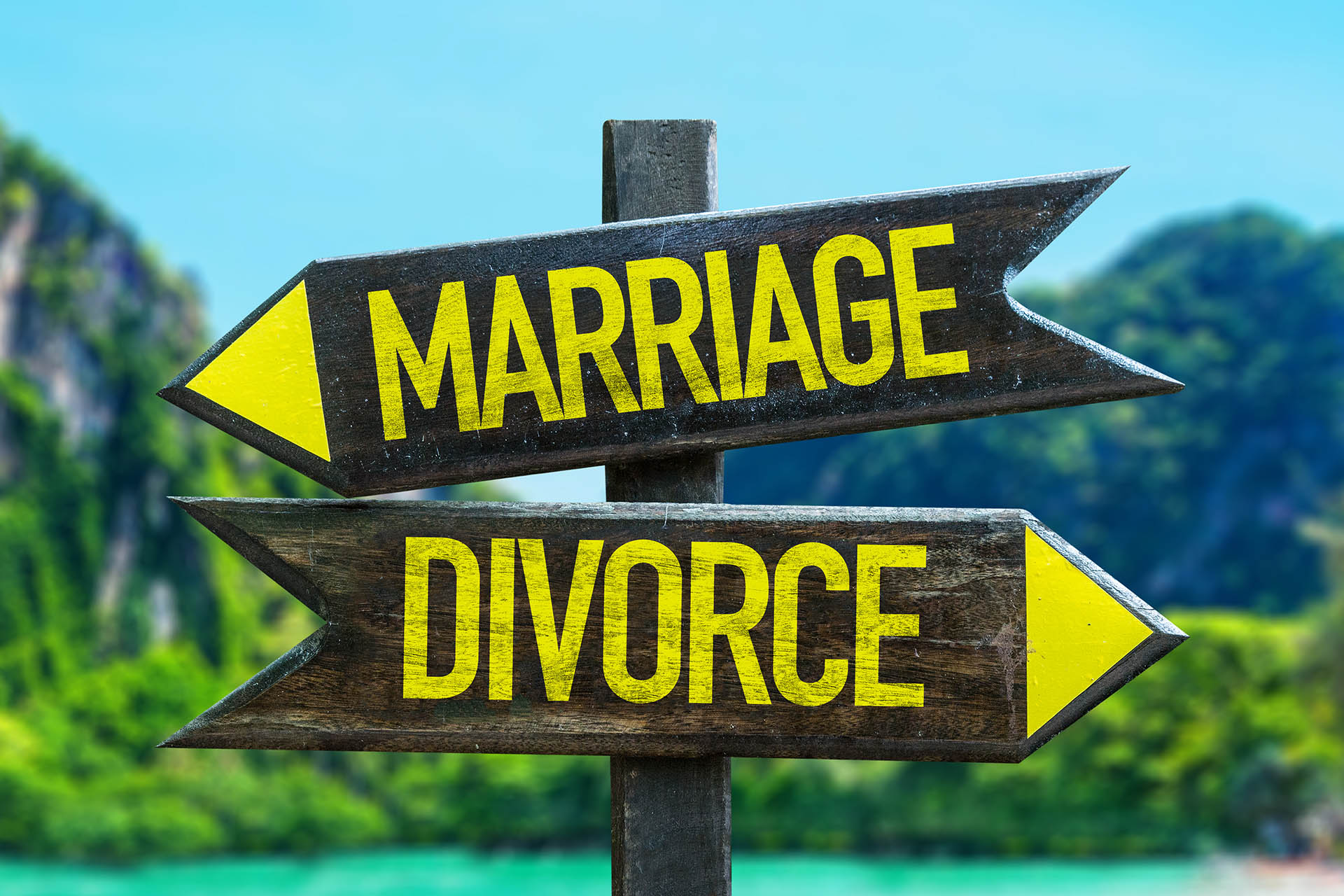Marriage – Divorce signpost in a beach background – Lawyer & Mediator ...